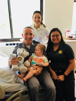 Troopers deliver teddy bears at hospitals - Harlan Enterprise | Harlan ...