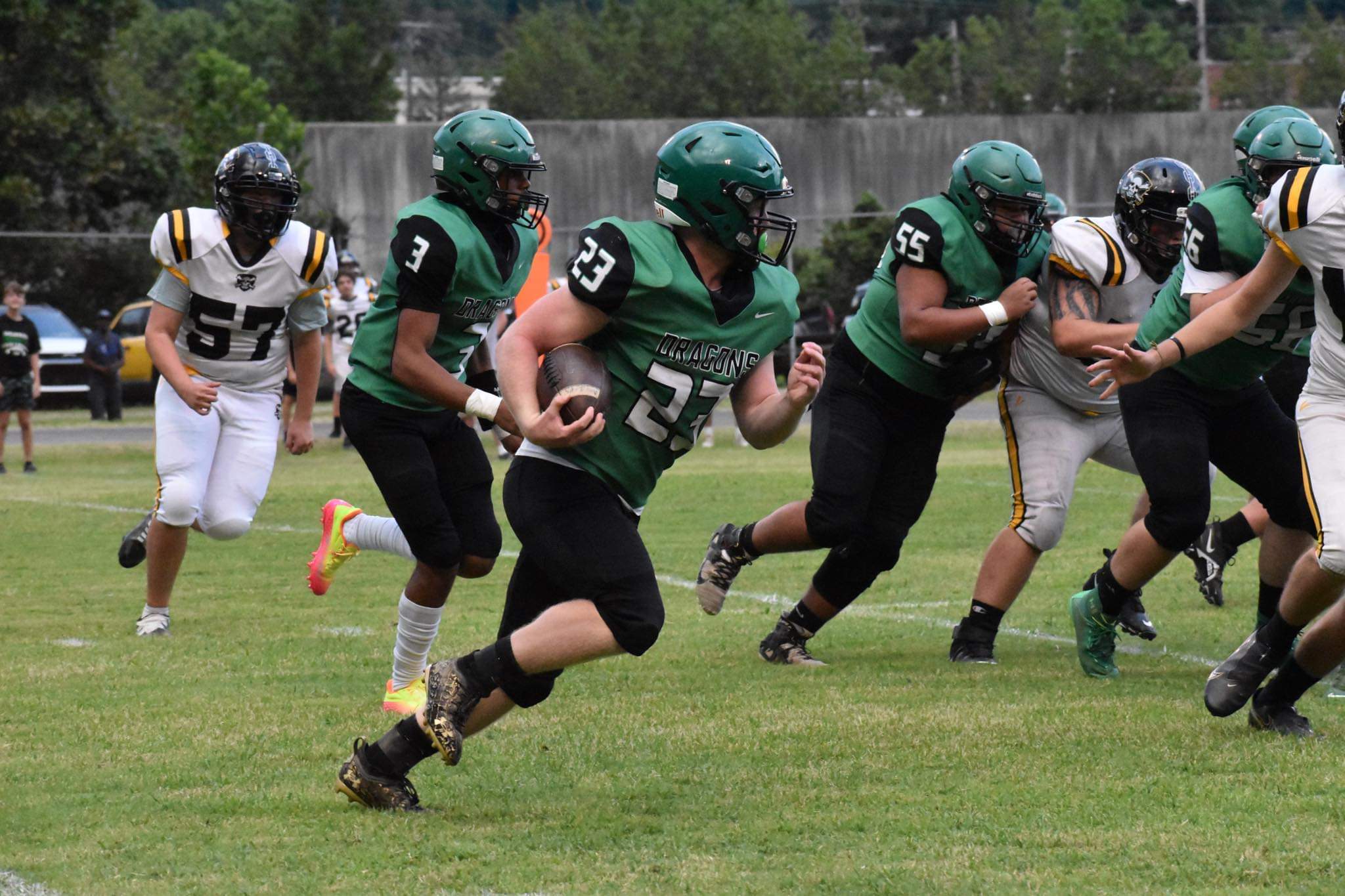 Running game carries Green Dragons to opening-season win - Harlan ...